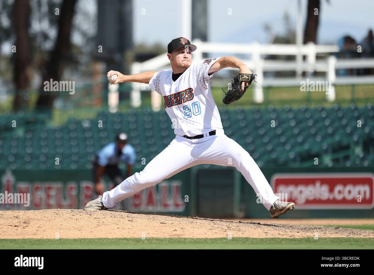 Kyle Roche (20) of the Inland Empire 66ers pitches against the Stockton ...