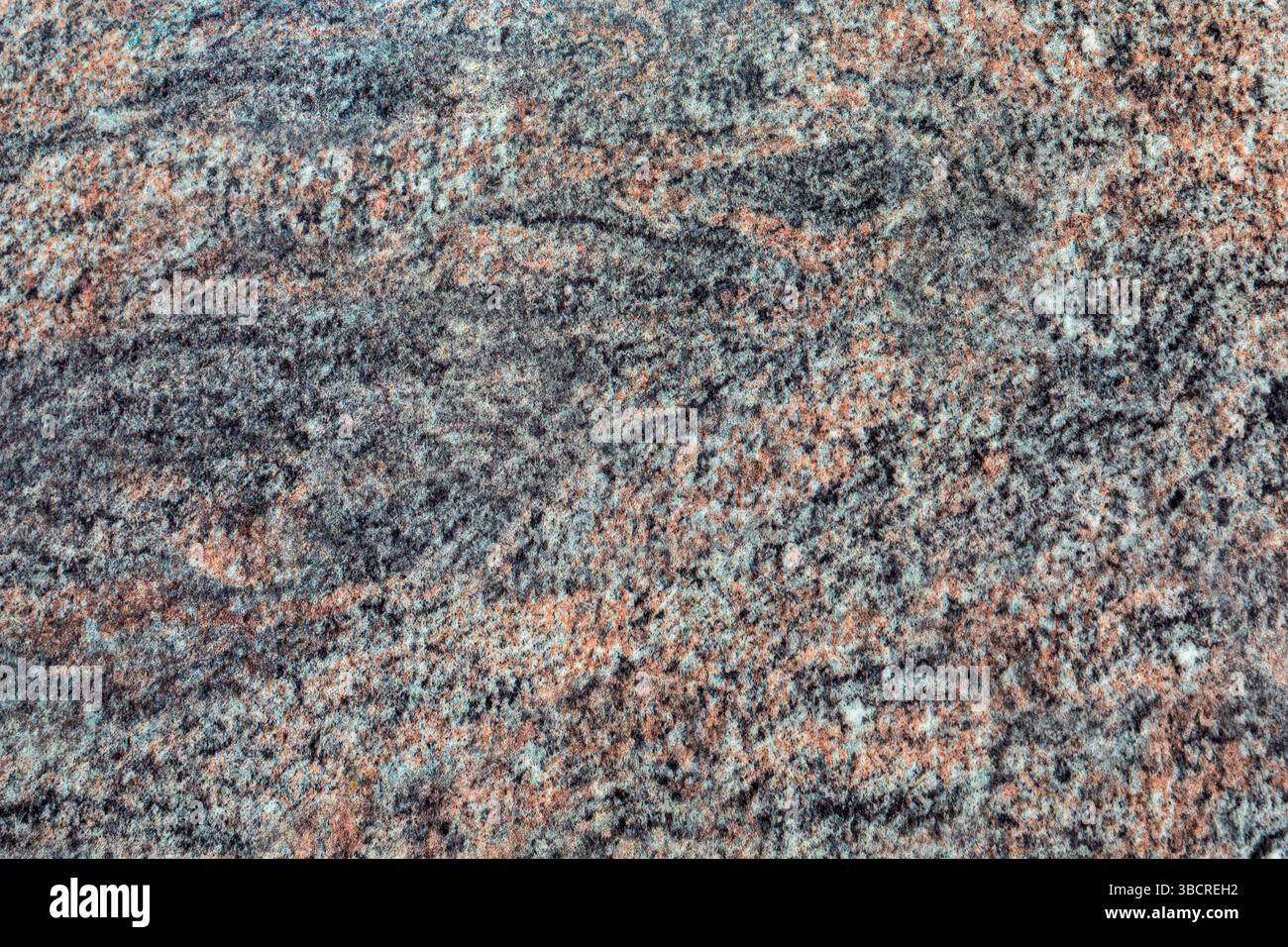 High-resolution close-up of multicolored polished granite with natural ...