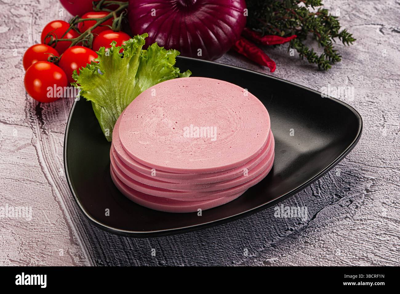 Boiled pork sliced sausage stack for breakfast Stock Photo - Alamy