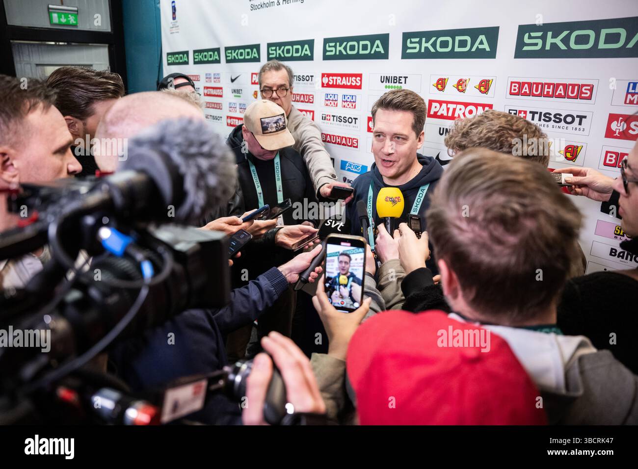 coach Sam Hallam of, Sweden. , . in the mixed zone ahead of a practice ...