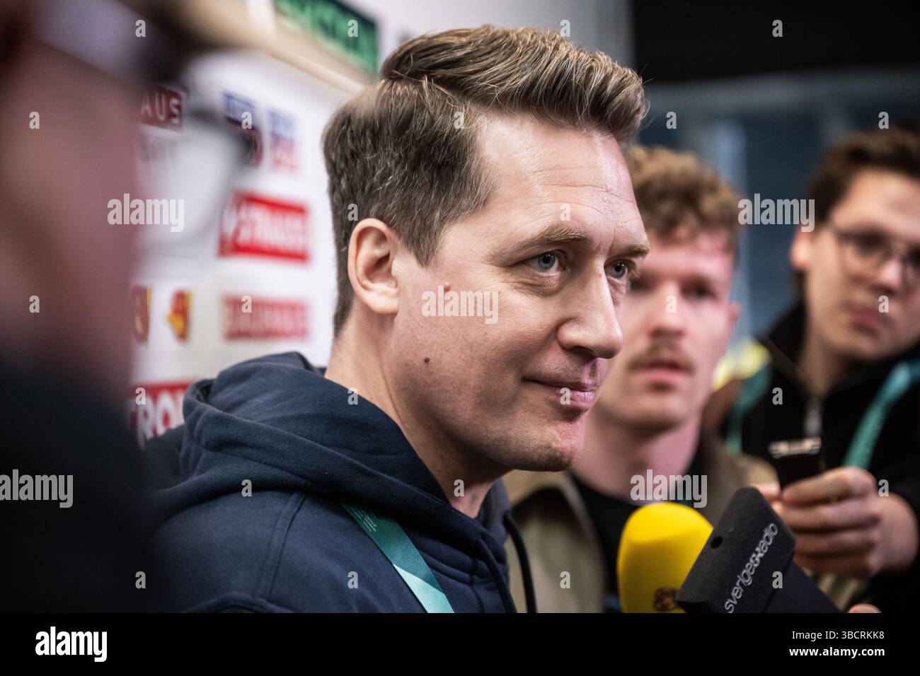 coach Sam Hallam of, Sweden. , . in the mixed zone ahead of a practice ...