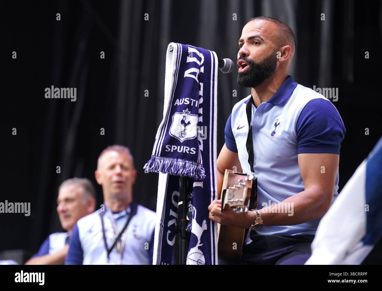 Former Tottenham Hotspur player Sandro plays guitar with the band on ...