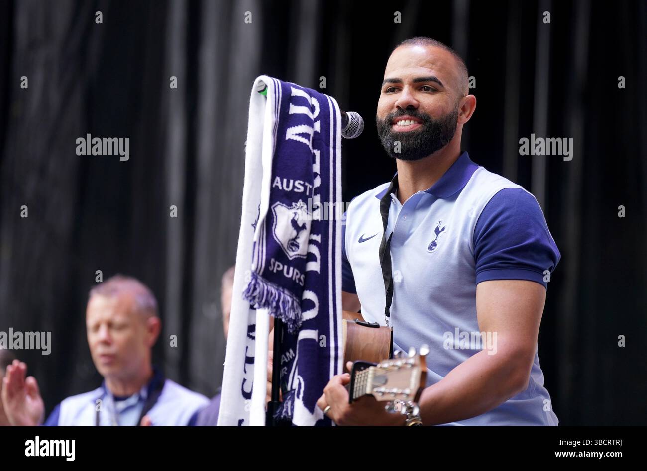 Former Tottenham Hotspur player Sandro plays guitar with the band on ...