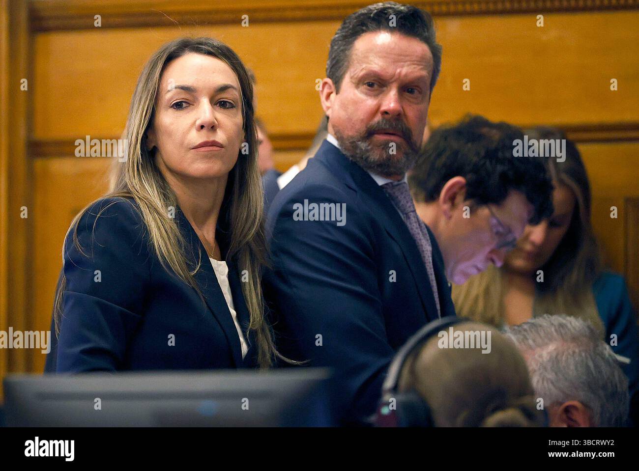 Karen Read and attorney Alan Jackson look at the empty jury box while ...