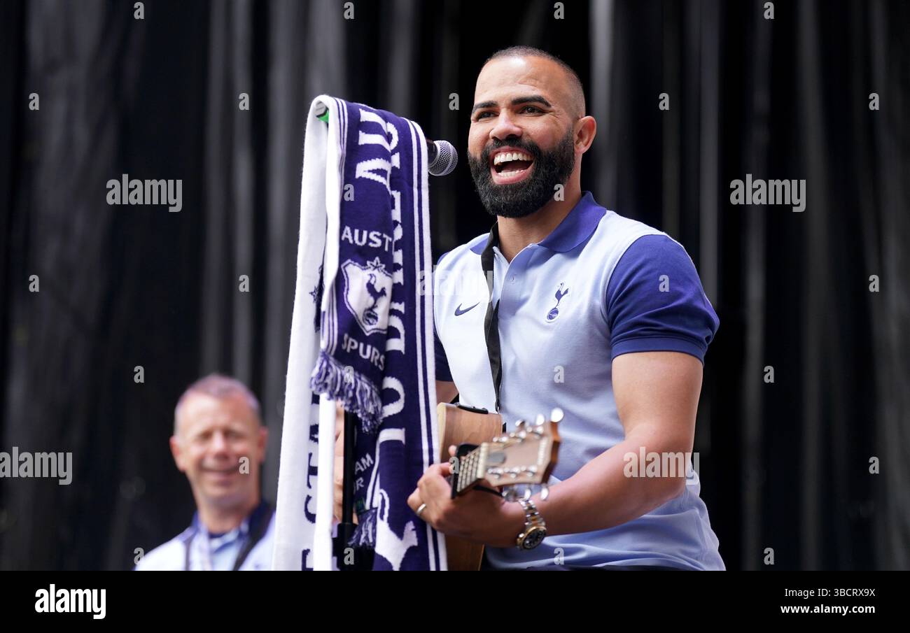 Former Tottenham Hotspur player Sandro plays guitar with the band on ...