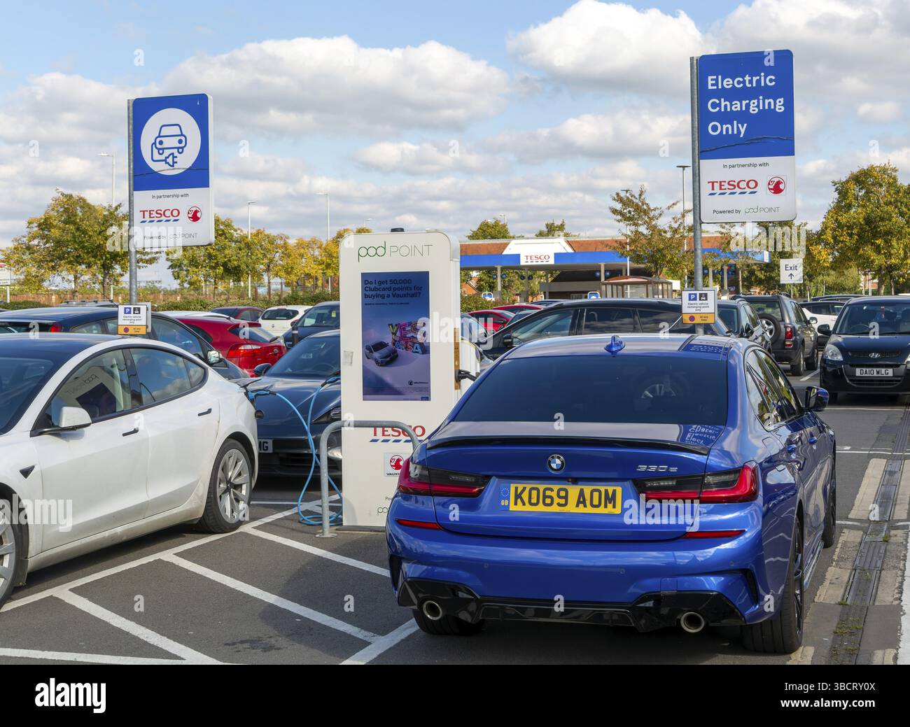 Electric vehicles charging Pod Point, Tesco Extra supermarket carpark ...