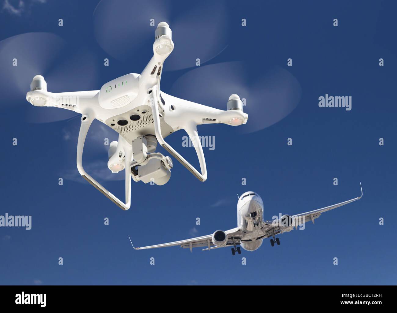 Unmanned aircraft system (UAV) quadcopter drone in the air too close to ...