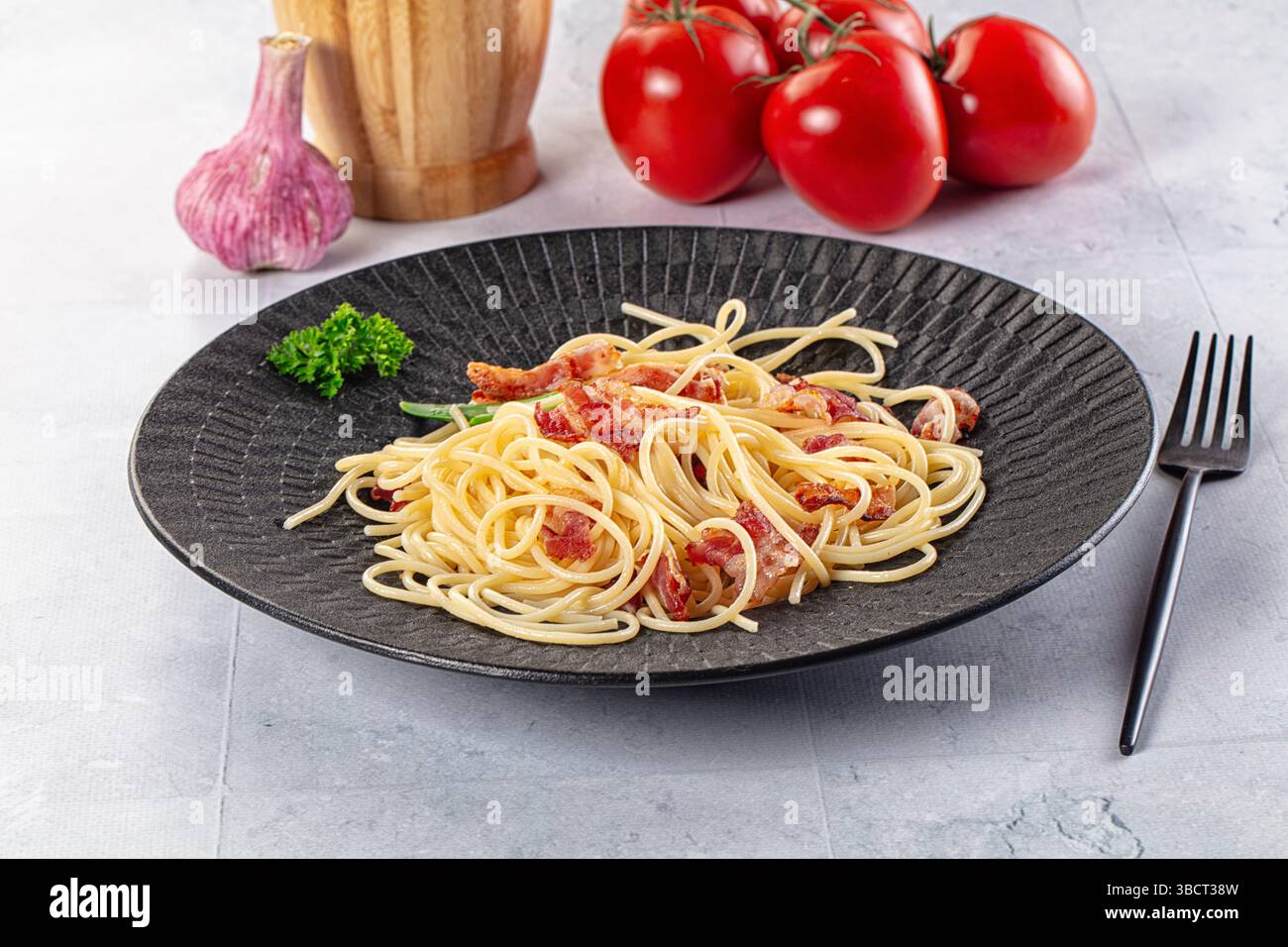Italian pasta spaghetti with roasted bacon Stock Photo - Alamy