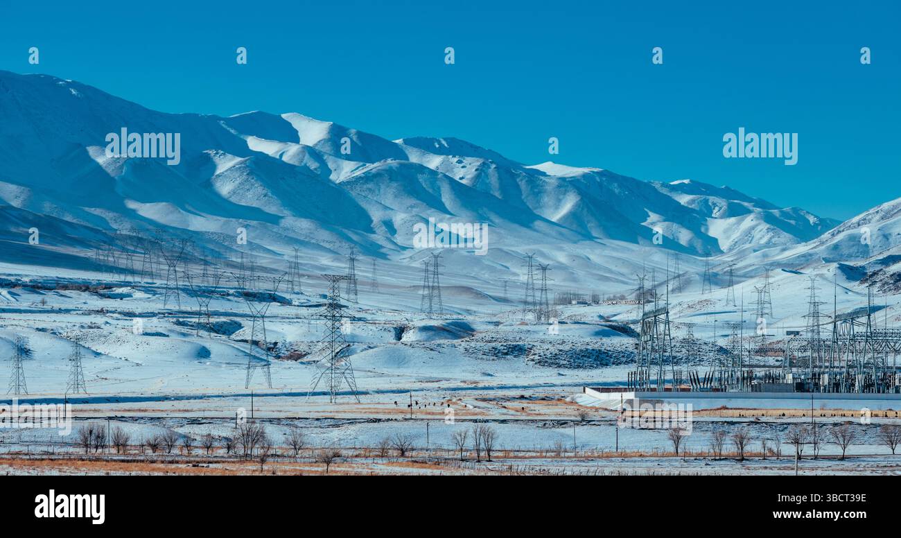 Electric power station in the mountains in winter Stock Photo - Alamy