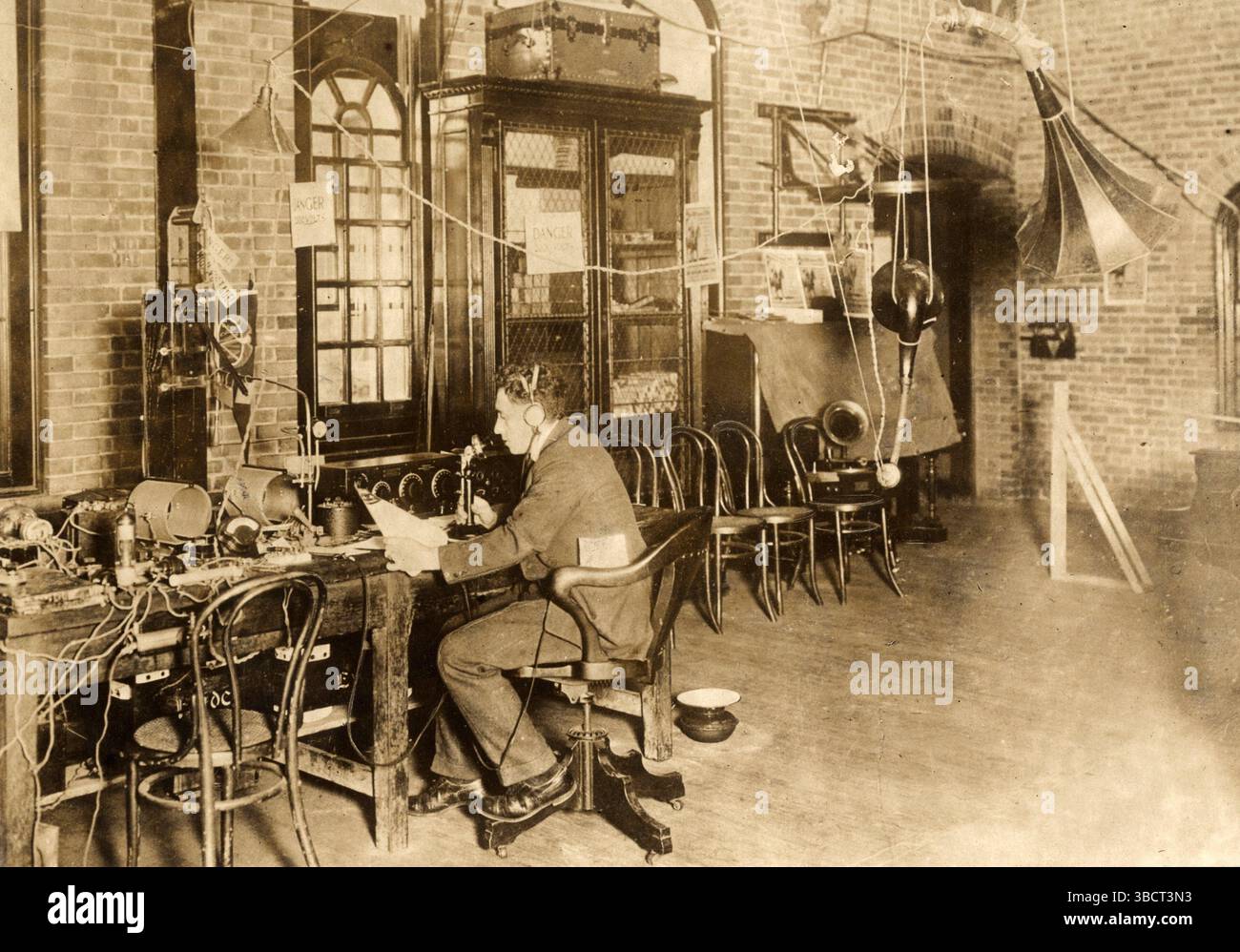 Radio reporting from newspaper, journalist behind the microphone in the ...