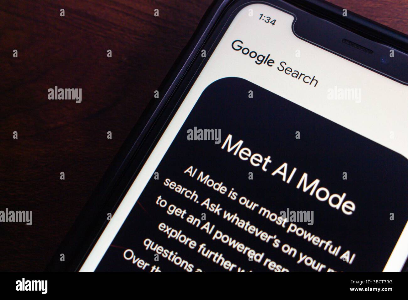 Smartphone screen displaying Google Search's AI Mode feature, showcasing advanced AI-powered ...