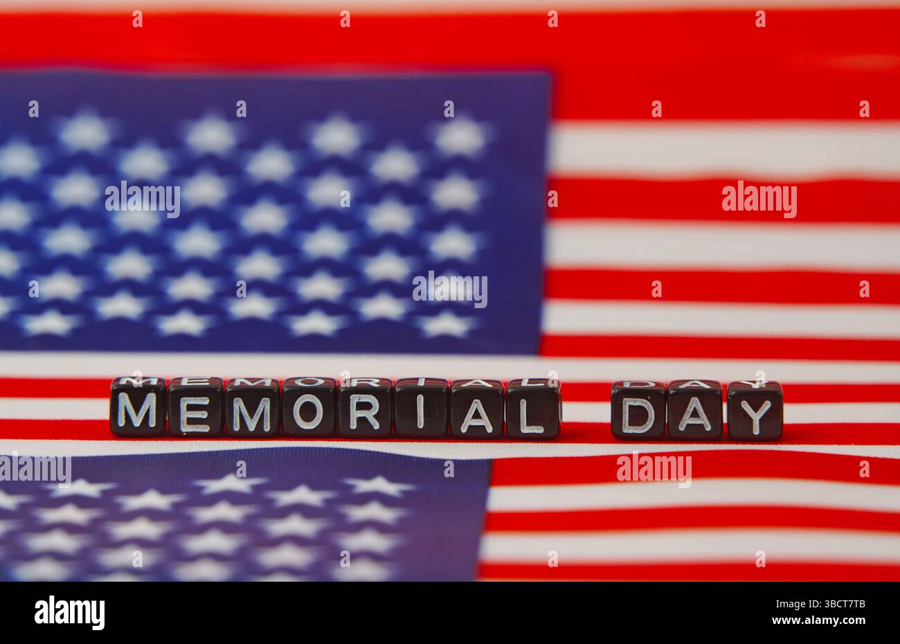 Inscription: Memorial Day on the background of the flags of the USA ...