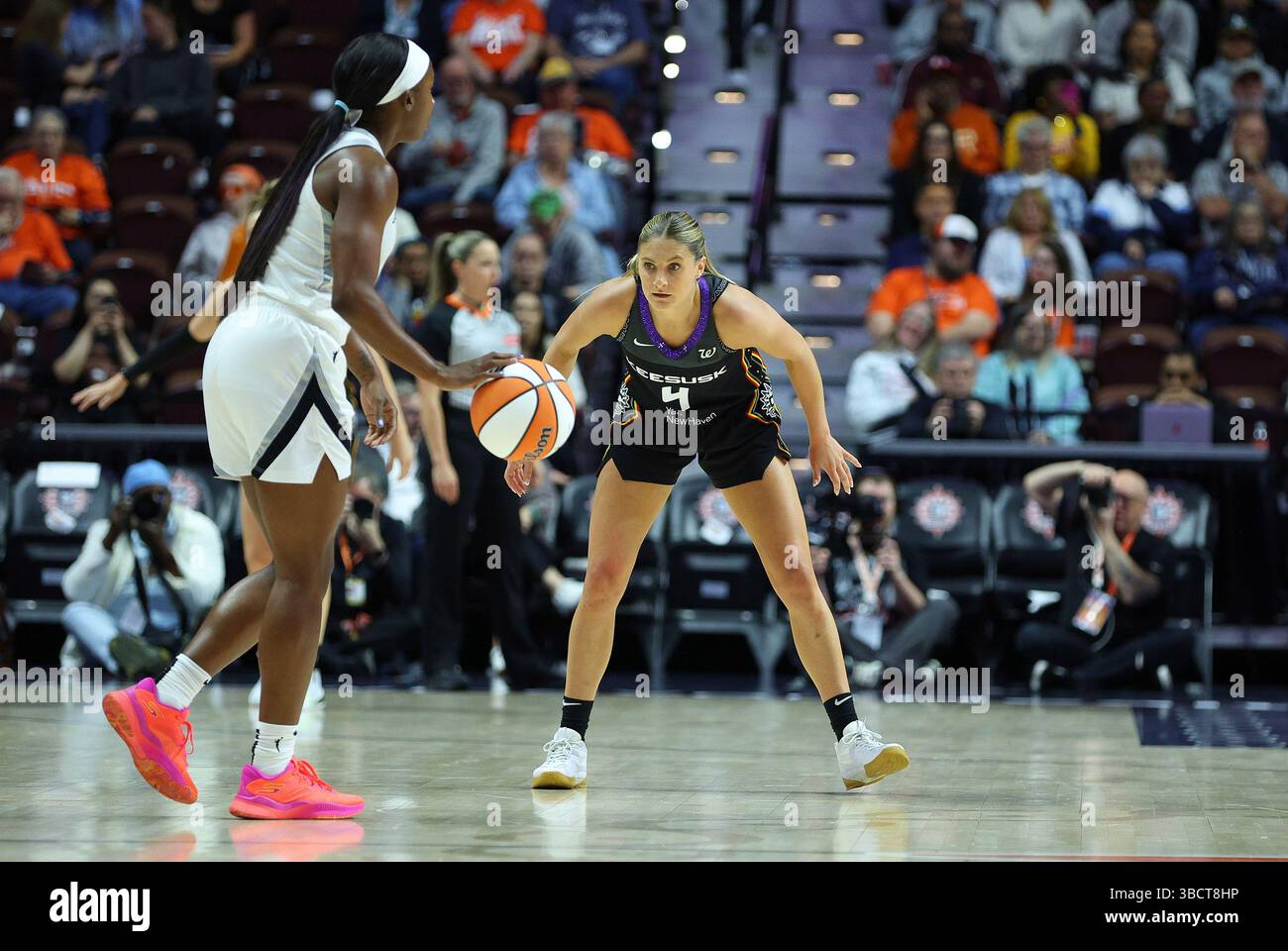 UNCASVILLE, CT - MAY 20: Connecticut Sun guard Jacy Sheldon (4) defends ...