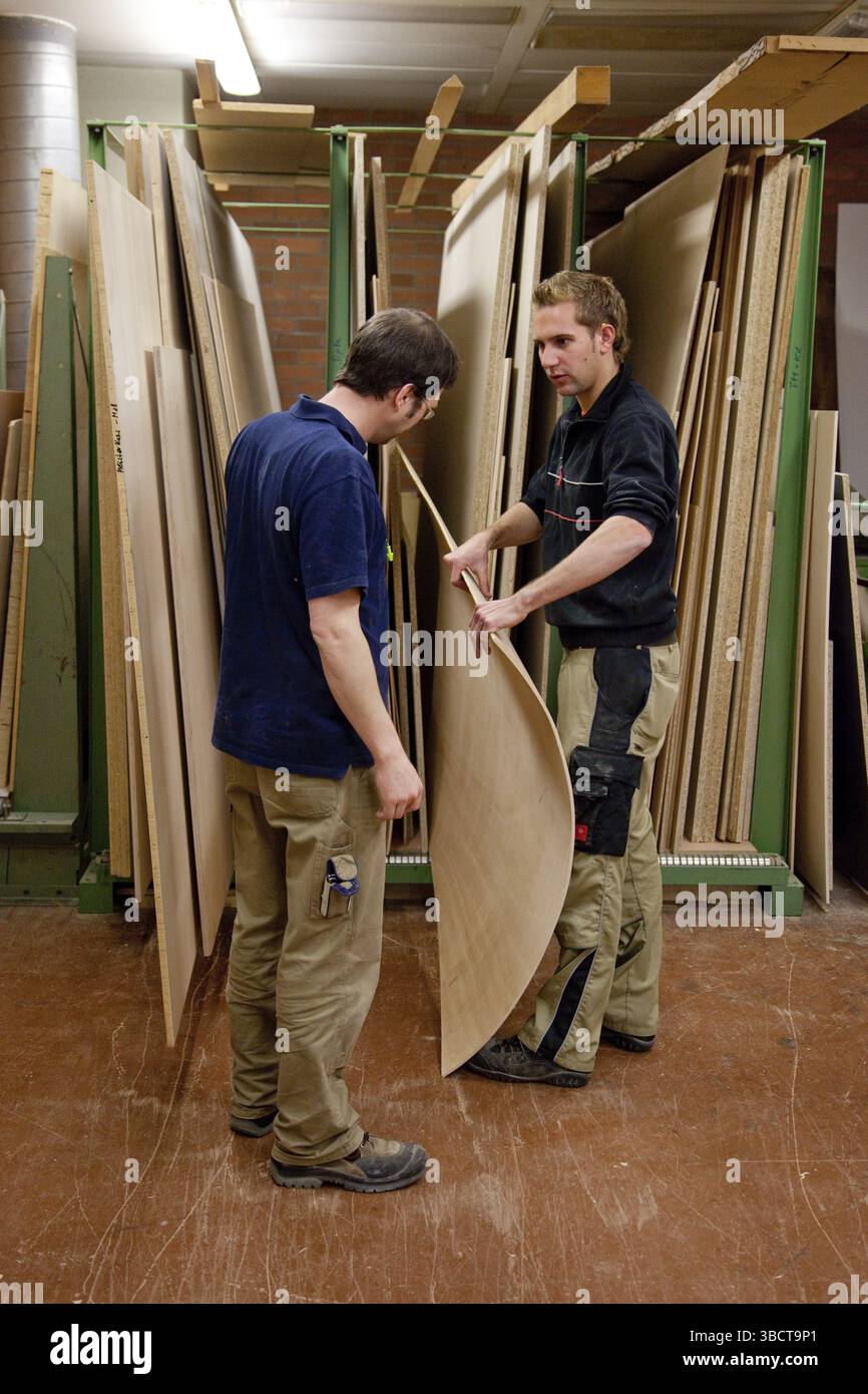 Master carpenter apprentices in a wood storage room, Master Craftman School of the Chamber of ...