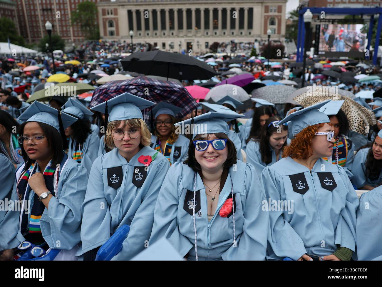 Students attend Columbia University commencement ceremony on Columbia's main campus, in ...
