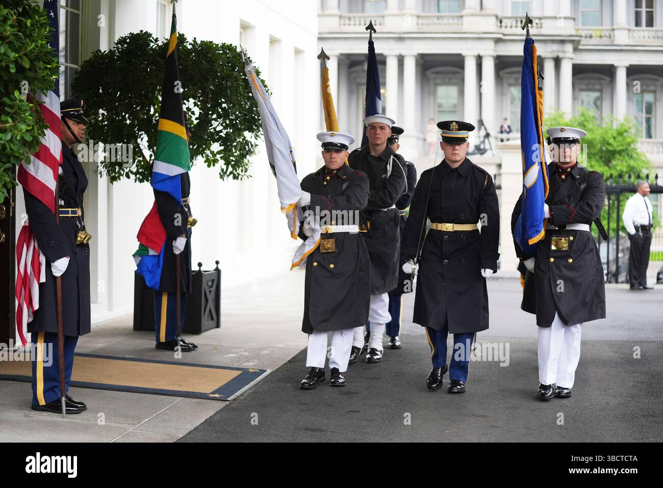 A military honor guard walks to position before President Donald Trump ...