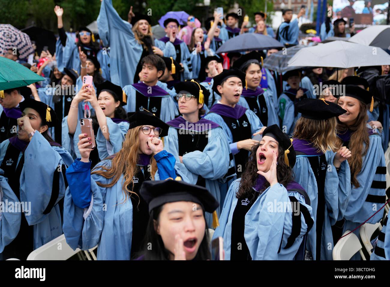 Graduates cheer during the Columbia University commencement ceremony on ...