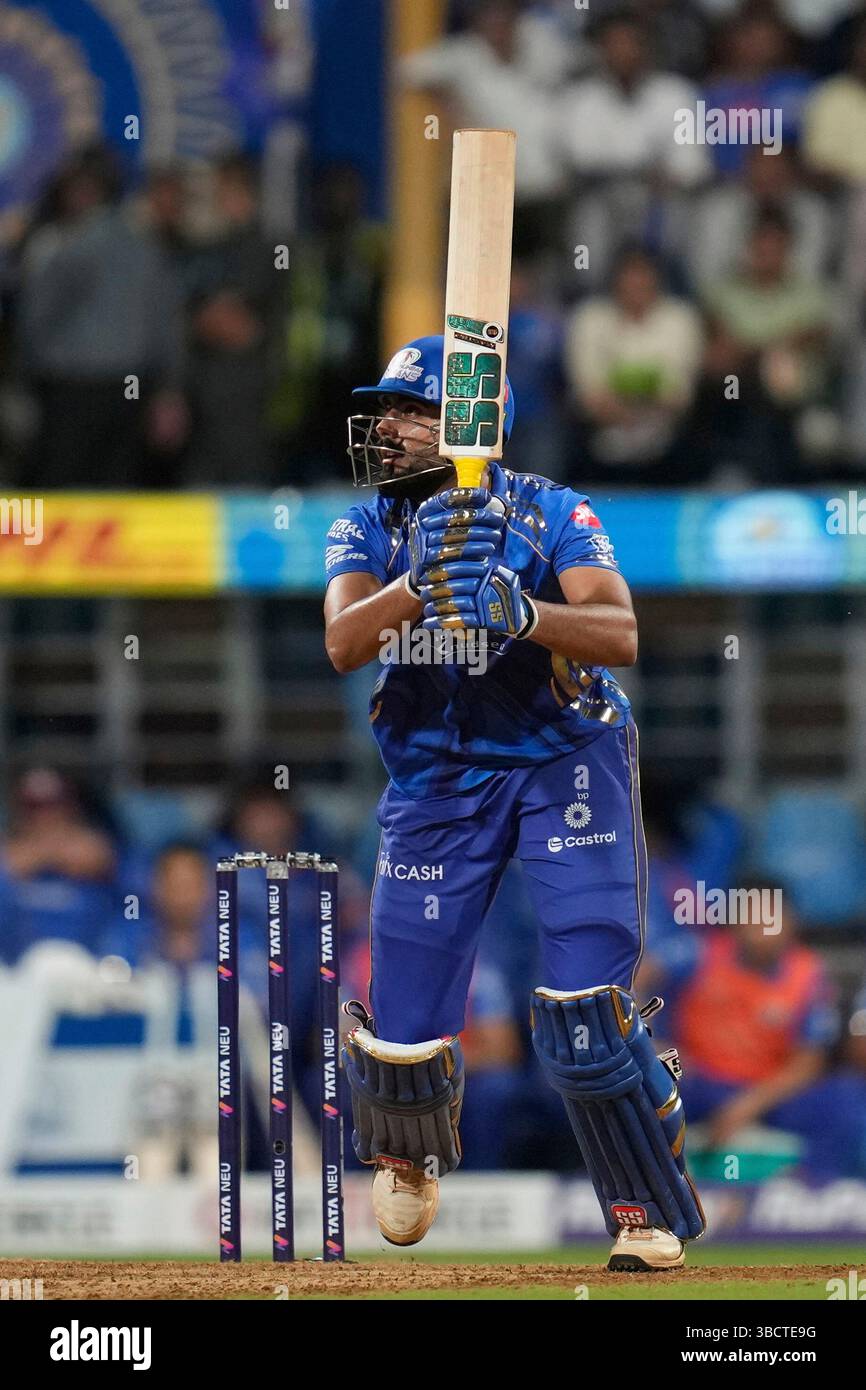 Mumbai Indians' Naman Dhir plays a shot during the Indian Premier League cricket match between ...