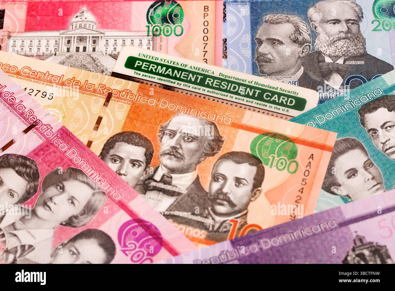American permanent resident card on Dominican money - Peso Stock Photo ...