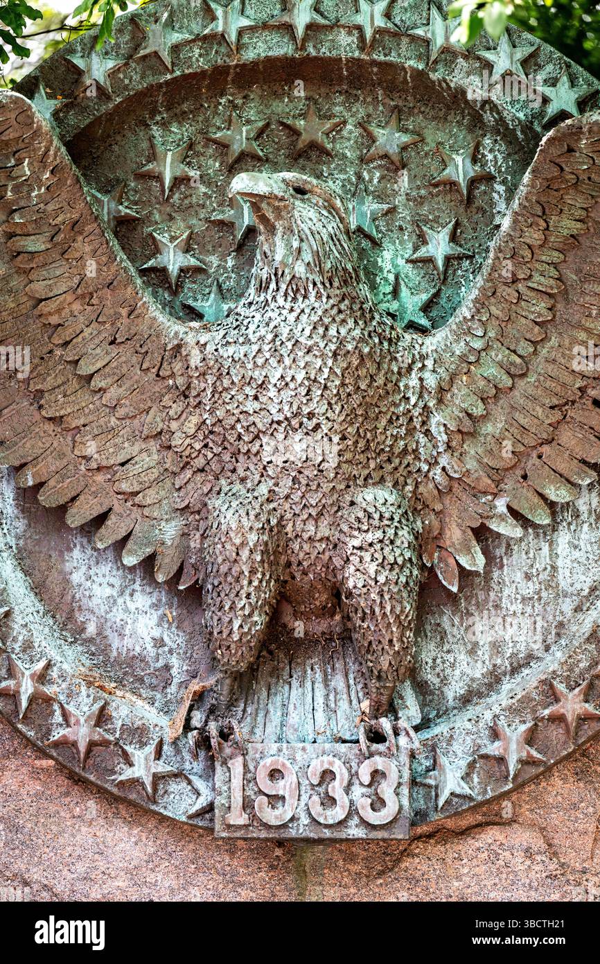 WASHINGTON, DC — A large bronze plaque featuring an eagle seal and the ...