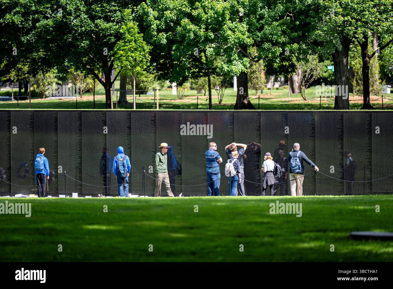 WASHINGTON DC — Tourists gather at the Vietnam Veterans Memorial on the ...