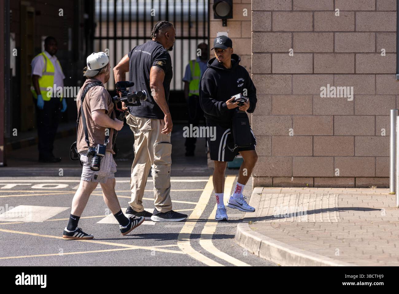 Members of R&B singer Chris Brown's team arrive at HMP Forest Bank in ...