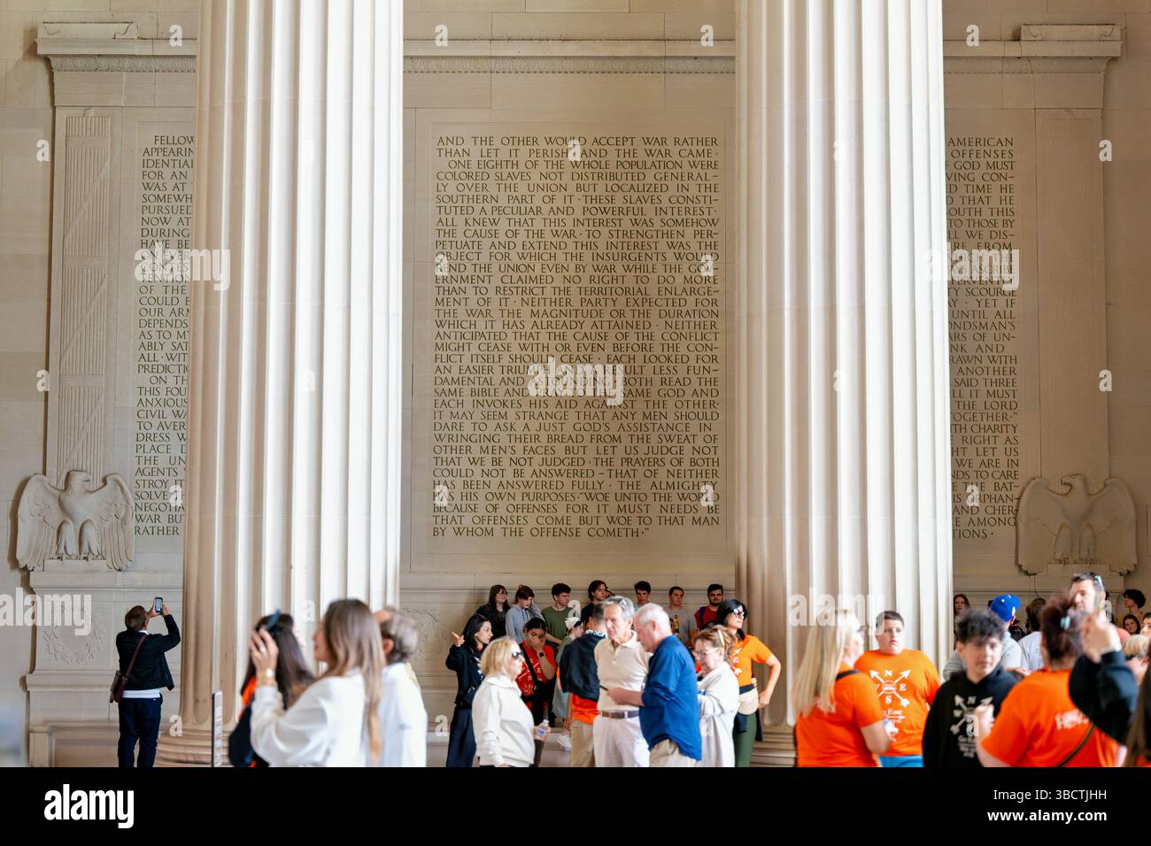 WASHINGTON DC — Visitors observe the engraved text of Abraham Lincoln's ...
