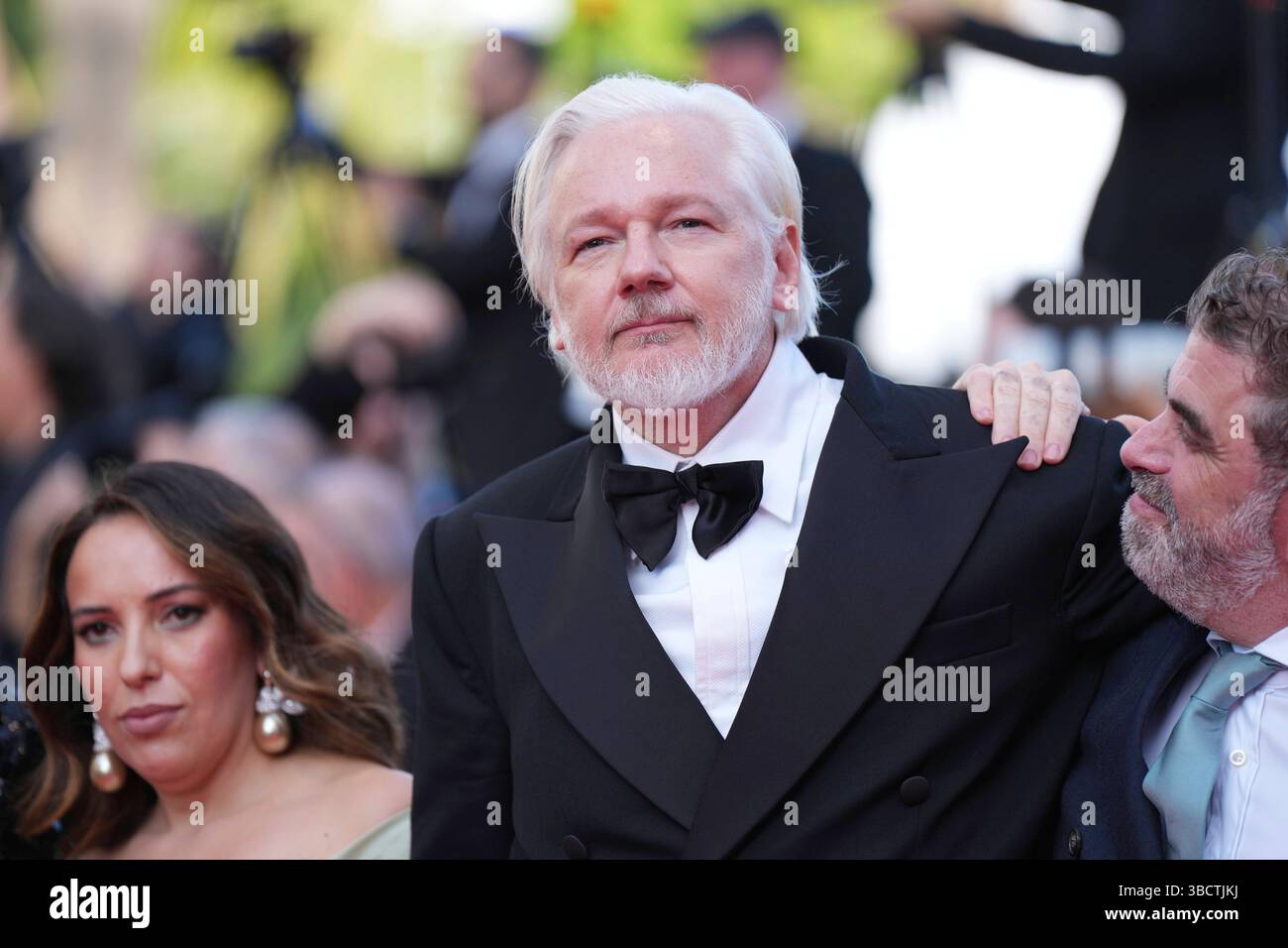 Julian Assange poses for photographers upon arrival at the premiere of ...