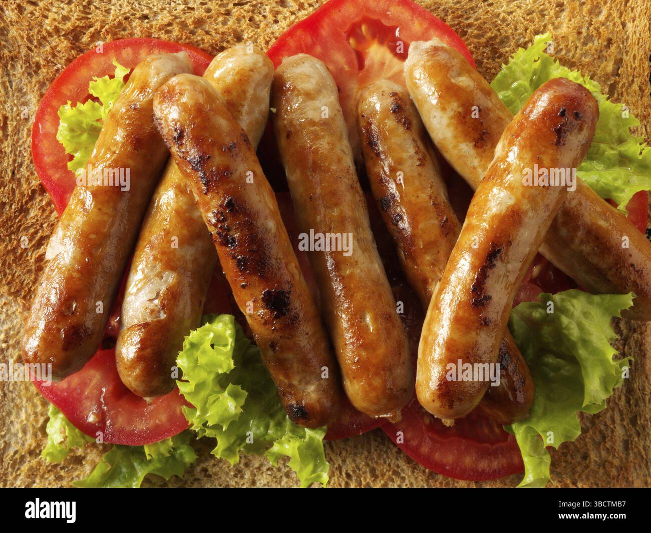 Traditional pork chipolata sausages Stock Photo - Alamy