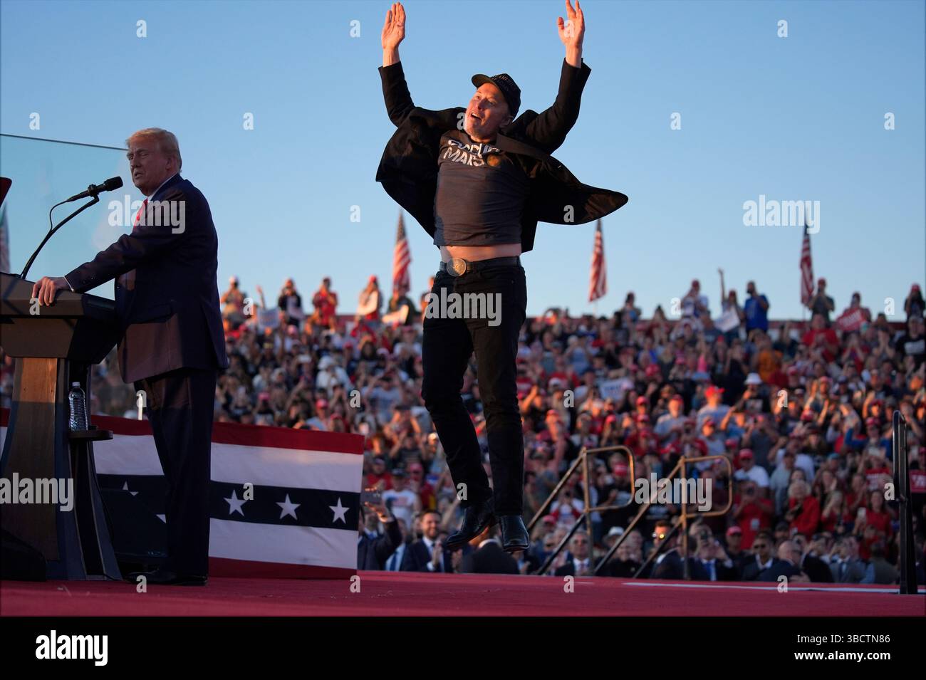 FILE - Elon Musk jumps on the stage as Republican presidential nominee ...