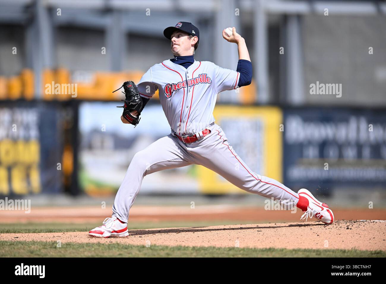 Greenville Drive pitcher Hayden Mullins (16) delivers a pitch during ...