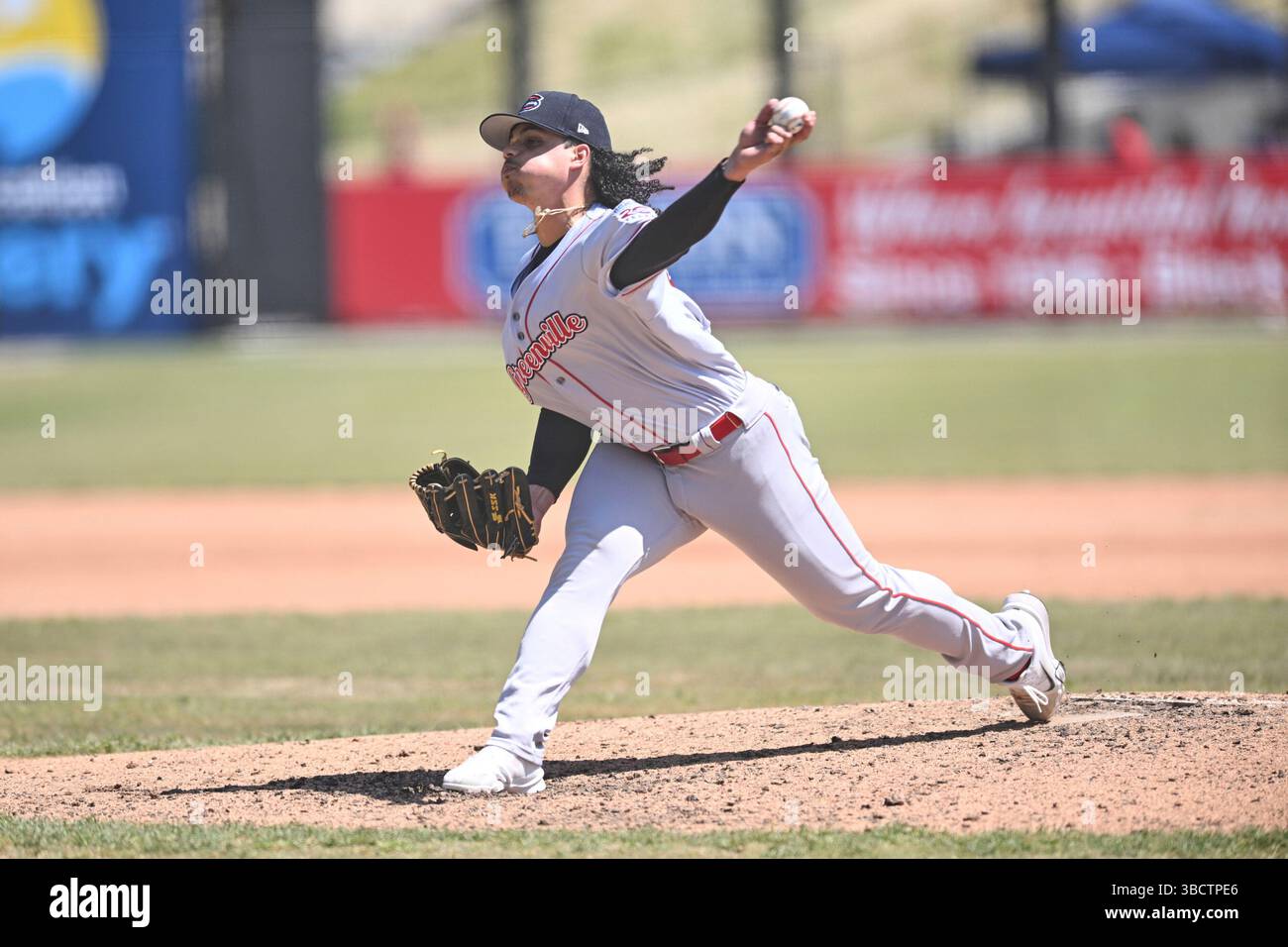Greenville Drive pitcher Erik Rivera (51) delivers a pitch during a game against the Asheville ...