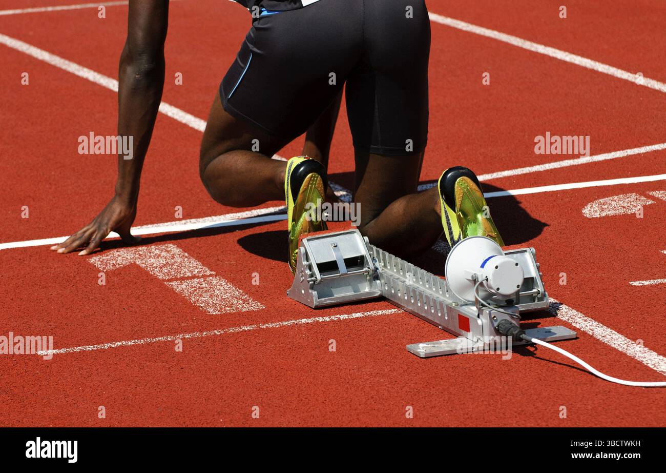 Legs of a male sprinter in a starting block, DAK Leichtathletik Gala ...