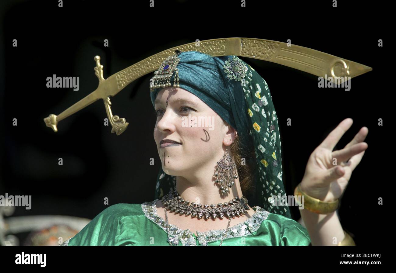 Saber dance and belly dancing, public performance in Venlo, Netherlands ...