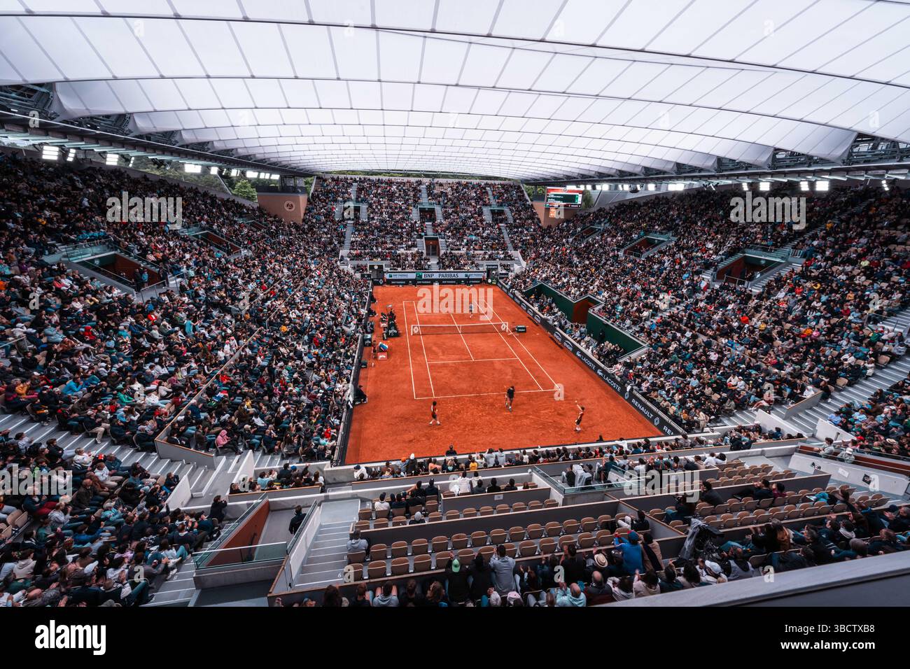 Geoffrey BLANCANEAUX of France and Thiago SEYBOTH WILD of Brasil in a crowded Suzanne Lenglen ...