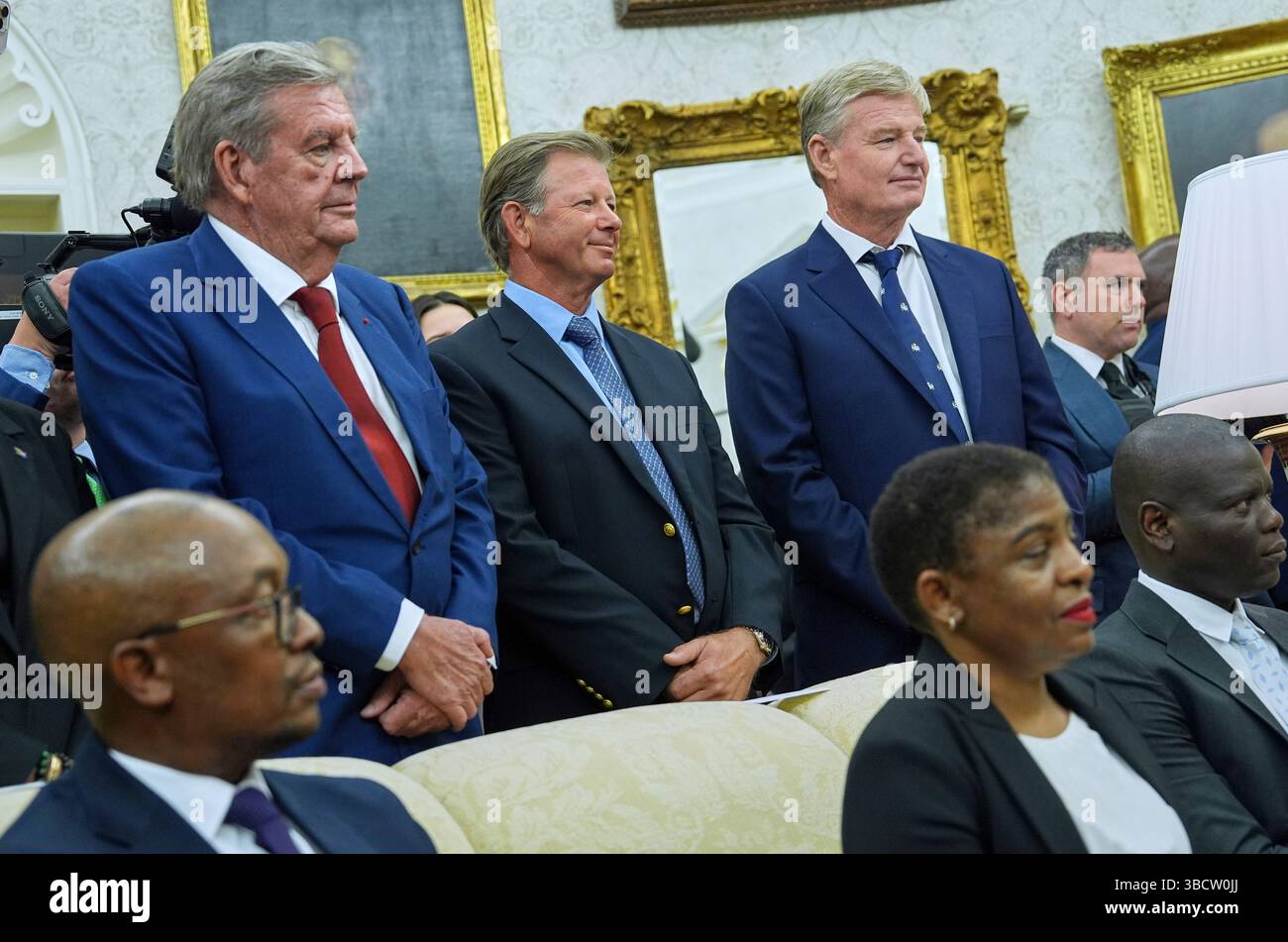 ADDS ID AT CENTER - South African businessman Johann Rupert, left, and ...