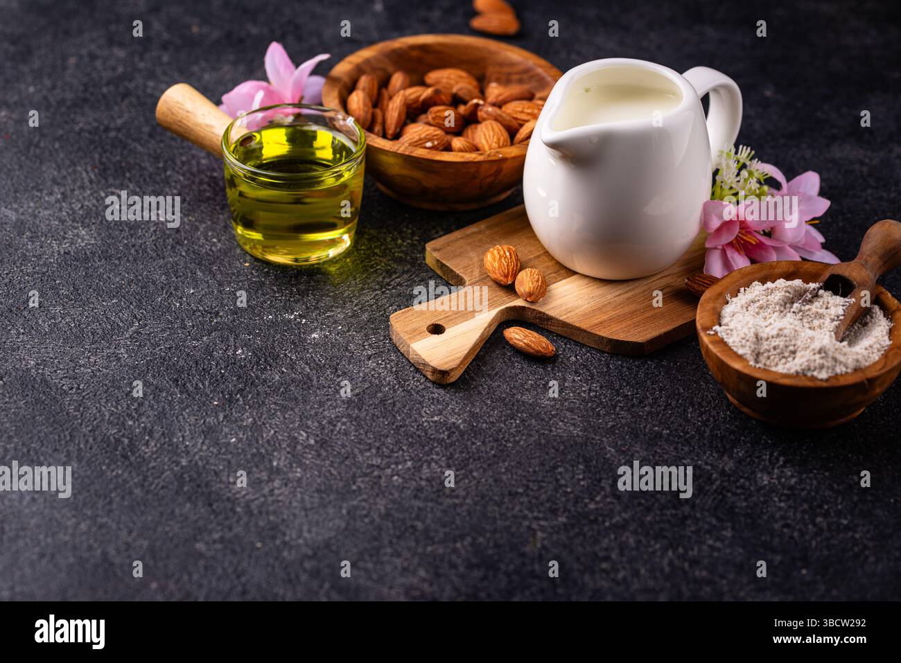 Almond alternative milk, oil and flour Stock Photo - Alamy