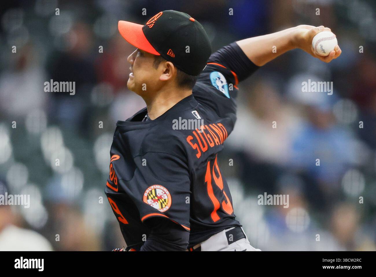 Baltimore Orioles starting pitcher Tomoyuki Sugano throws to the ...