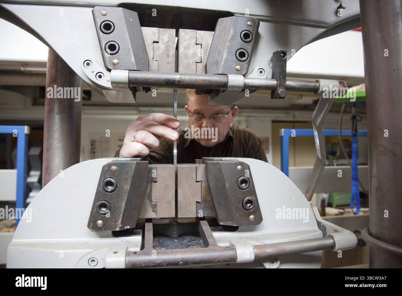 Welding engineer at a Universal Testing Machine for tension and ...