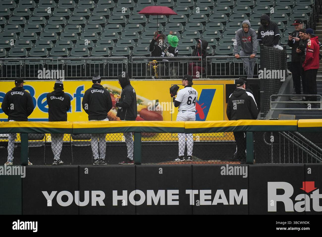 Chicago White Sox starting pitcher Shane Smith (64) warms up before a ...
