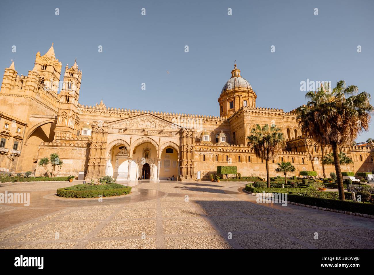 The grand entrance of Palermo Cathedral framed by Moorish arches and ...