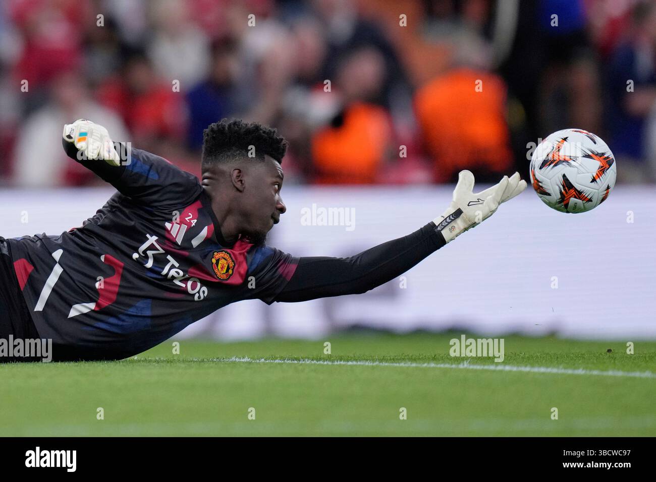 Manchester United's goalkeeper Andre Onana warms up prior to the Europa ...