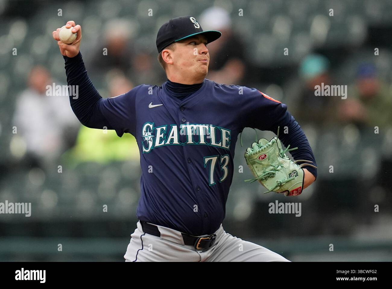 Seattle Mariners starting pitcher Logan Evans (73) throws during the ...