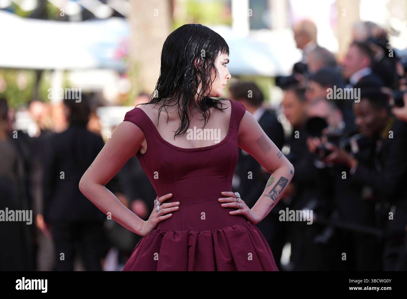 Cara Delevingne poses for photographers upon arrival at the premiere of ...