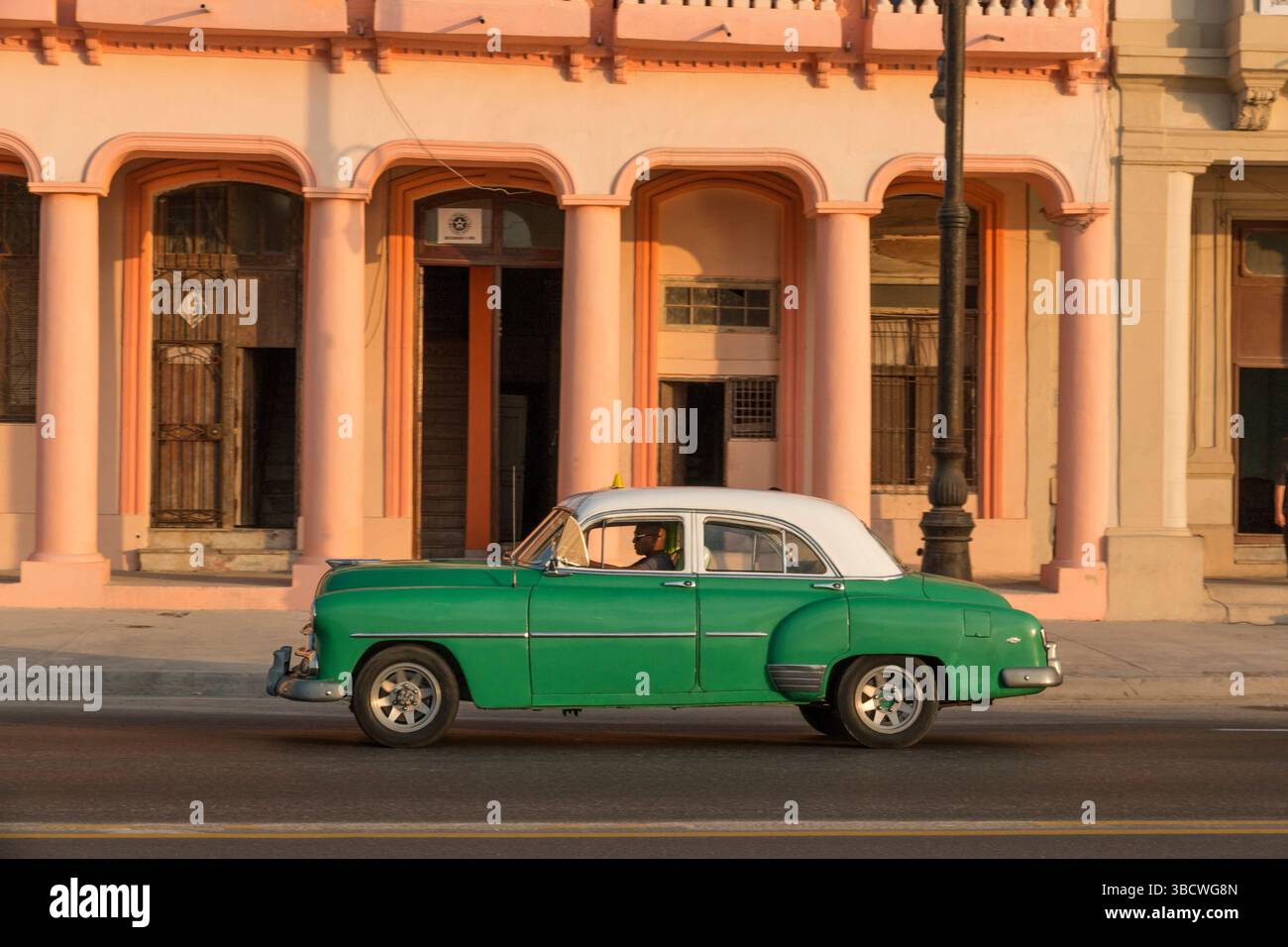 Cuba, Havana. 1954 Chevrolet. Vintage cars along Havana's old city ...