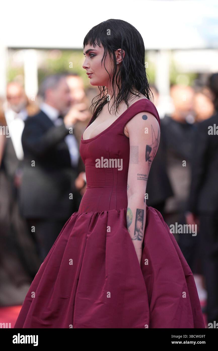 Cara Delevingne poses for photographers upon arrival at the premiere of ...