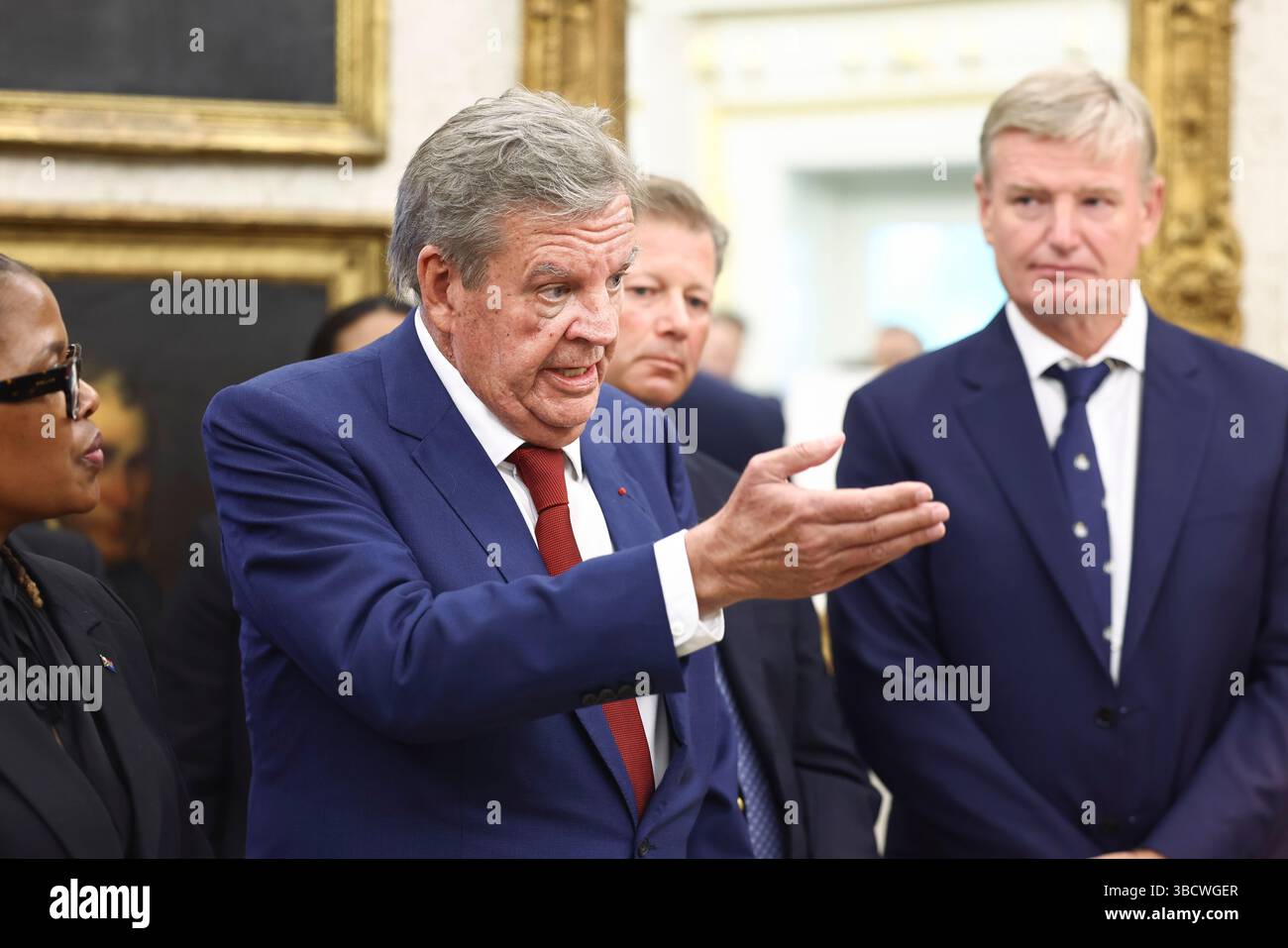 Businessman Johann Rupert, left, speaks during a meeting between US ...