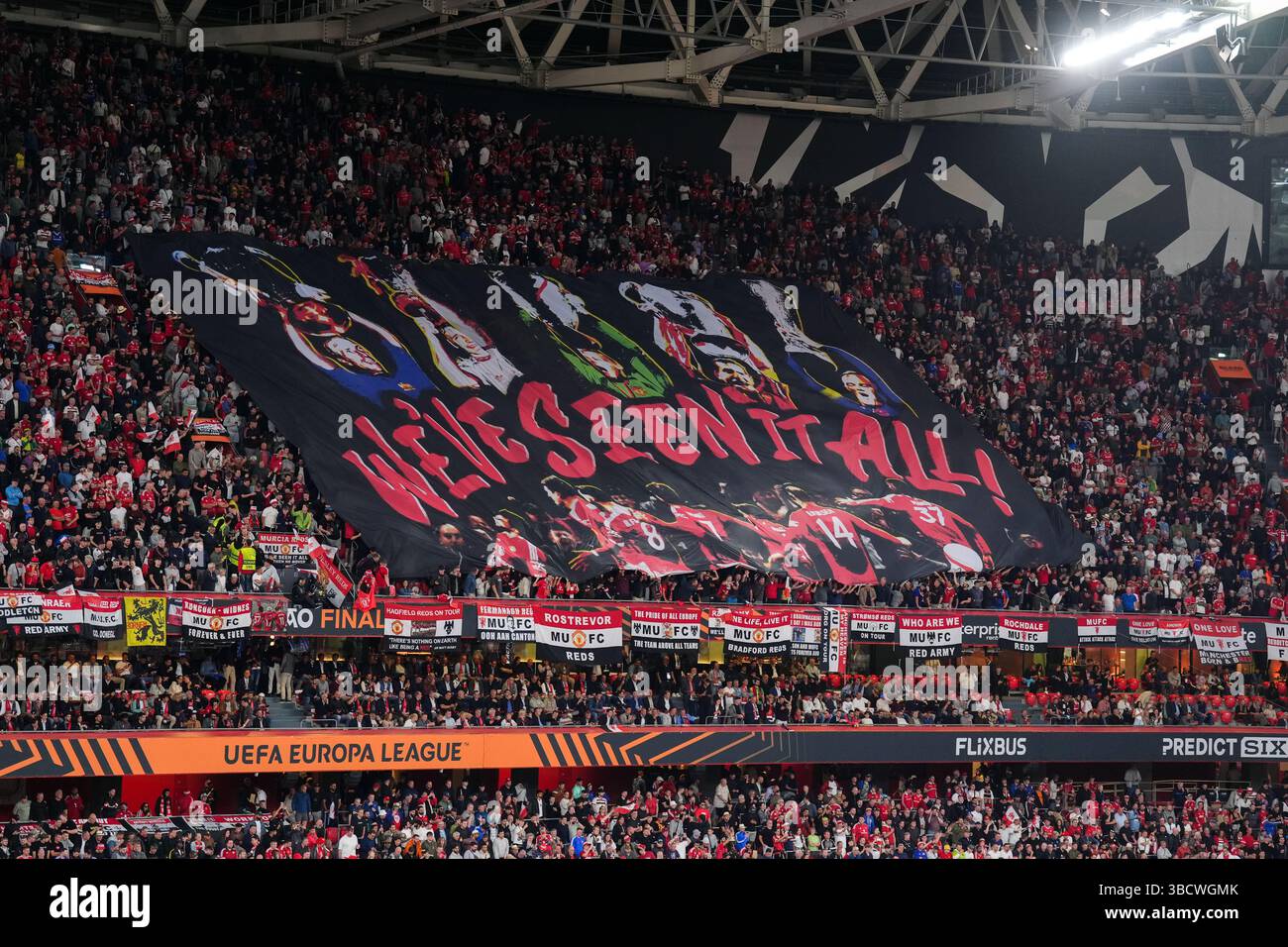 Manchester United fans display a banner ahead of the UEFA Europa League ...