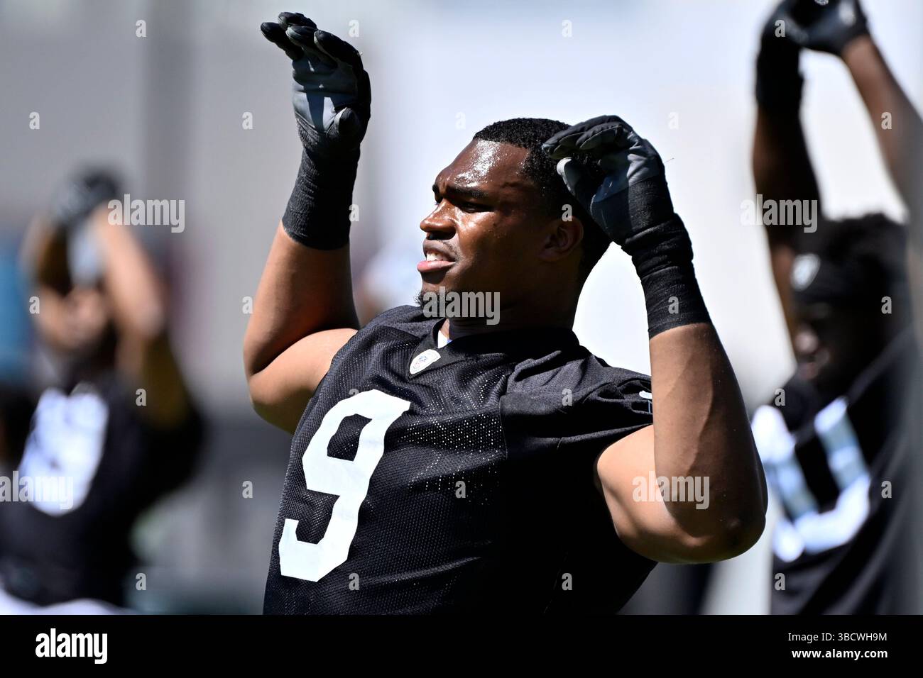 Las Vegas Raiders defensive end Tyree Wilson warms up during NFL ...