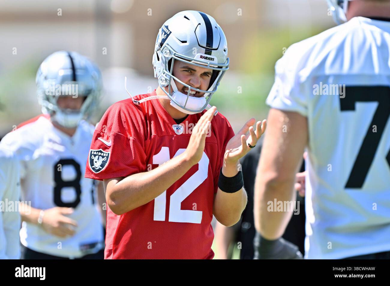 Las Vegas Raiders quarterback Aidan O'Connell (12) warms up during NFL ...